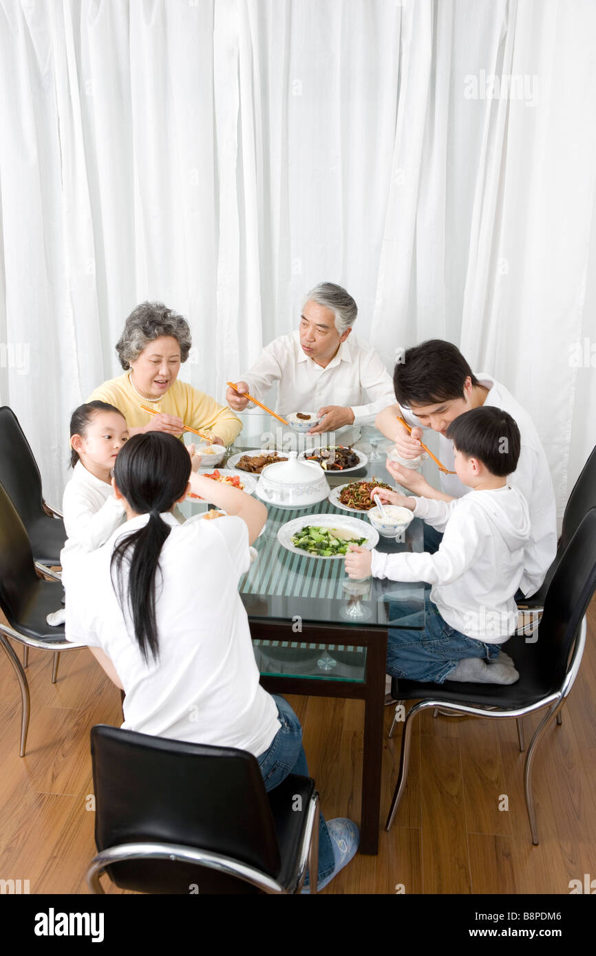 Chinese father and son eating rice hi-res stock photography and images ...
