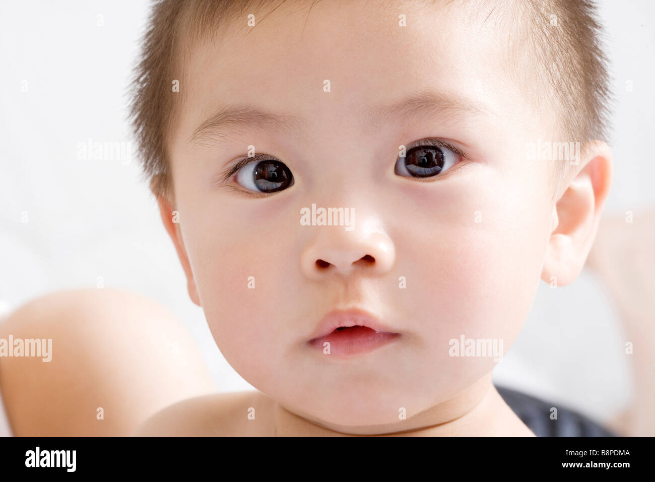 Baby boy close up portrait Stock Photo - Alamy