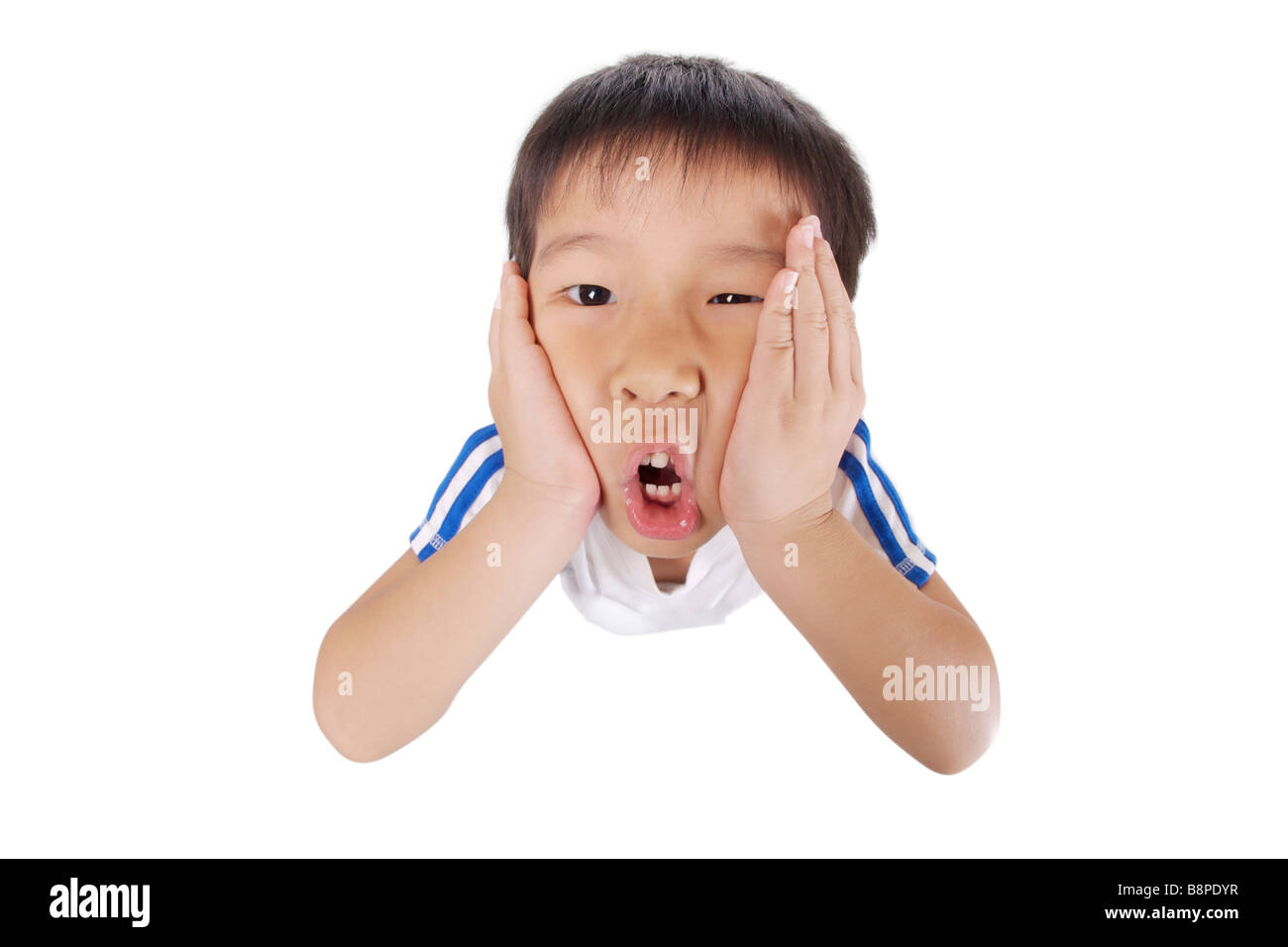 Boy squeezing his face portrait Stock Photo - Alamy