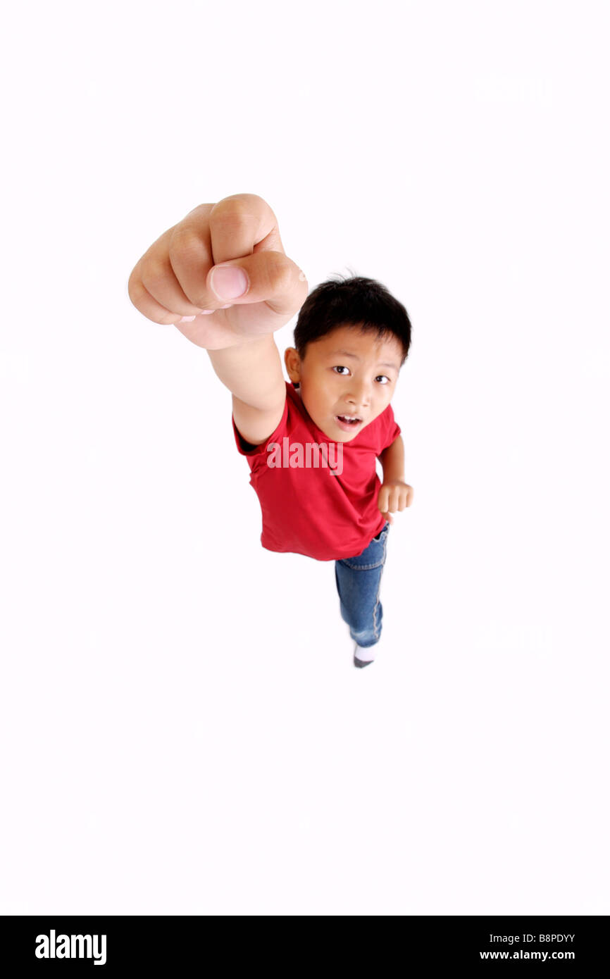 Boy punching the air portrait close up Stock Photo - Alamy