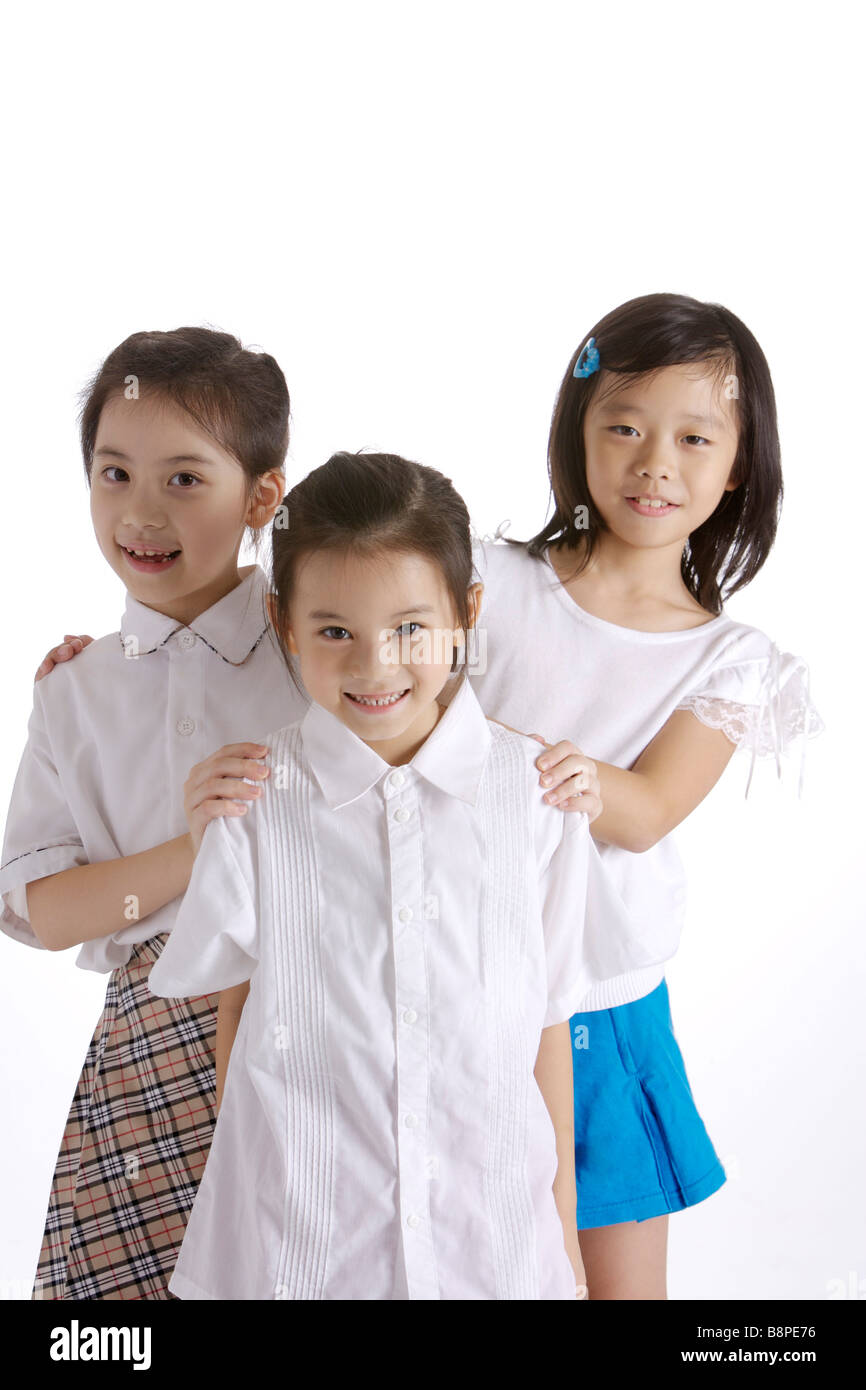Three girls smiling portrait Stock Photo - Alamy