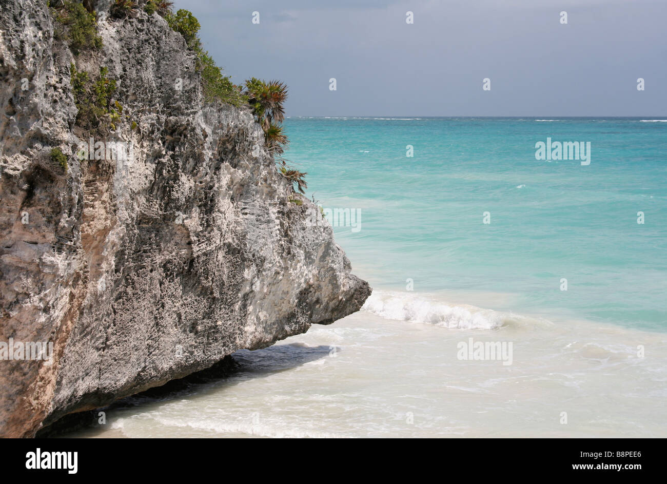 Jagged Cliff Turquoise Sea Stock Photo - Alamy