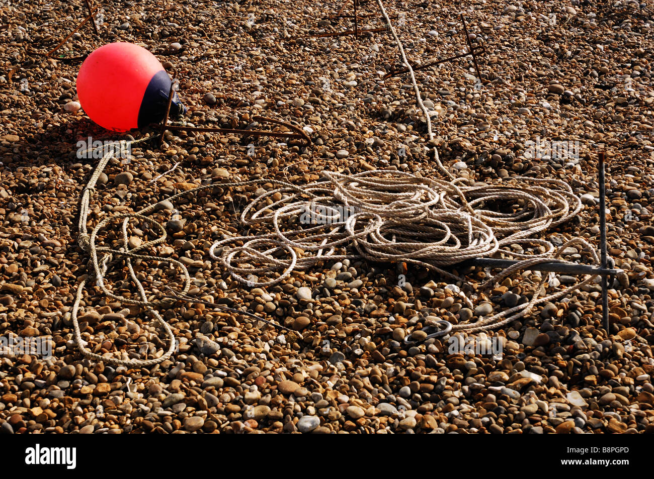 Float and ropes on beach Stock Photo - Alamy