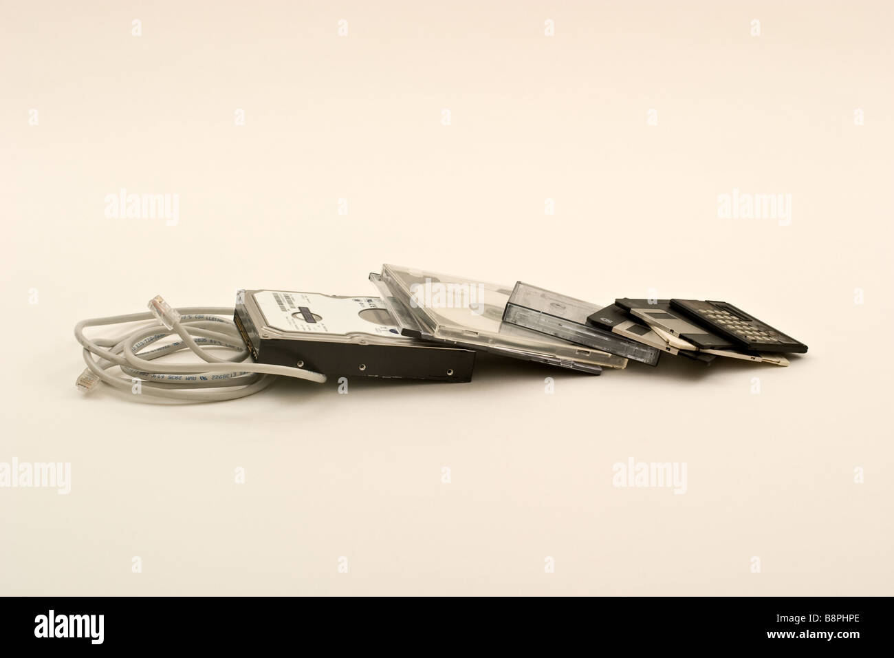 Various computer storage technology items in a line in order of ...