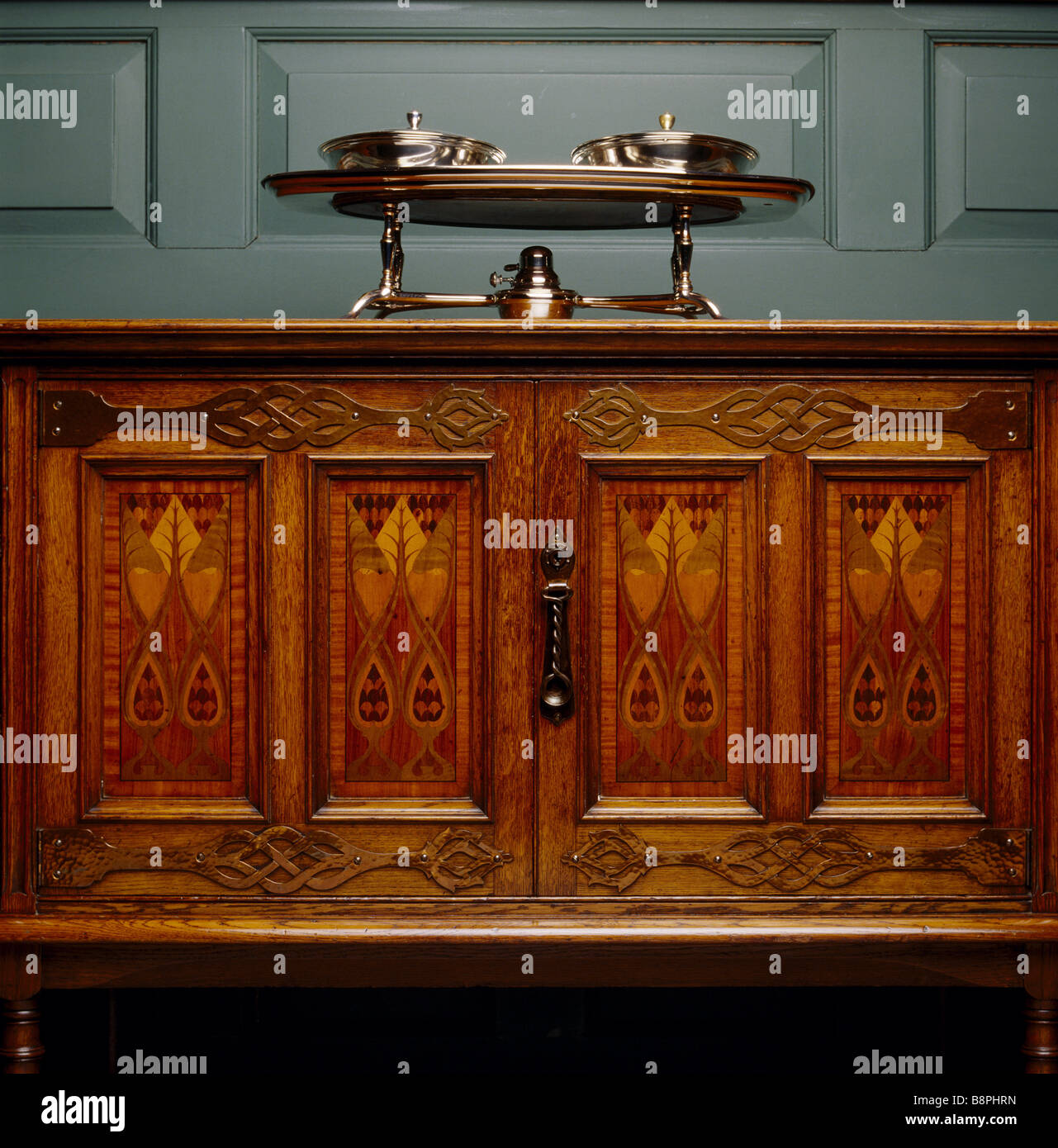 Sideboard by LLewellyn Rathbone with marquetry panels and silvered ...