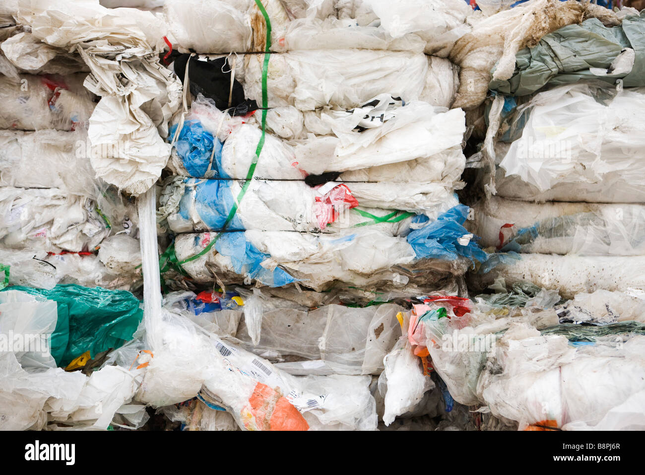 Bales of flattened plastic, full frame Stock Photo - Alamy
