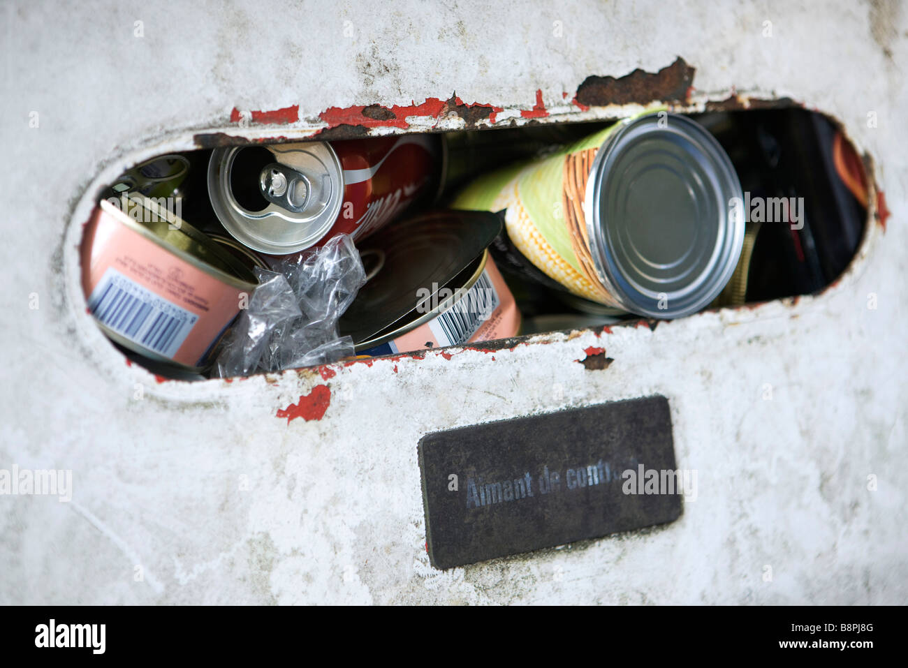 Recycling bin filled with cans, extreme close-up Stock Photo - Alamy