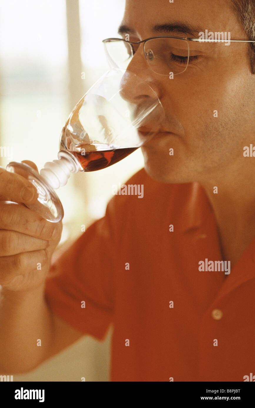 Man tasting red wine Stock Photo - Alamy