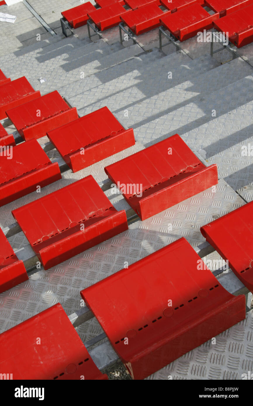 rows of red empty vacant seats in sport arena Stock Photo - Alamy