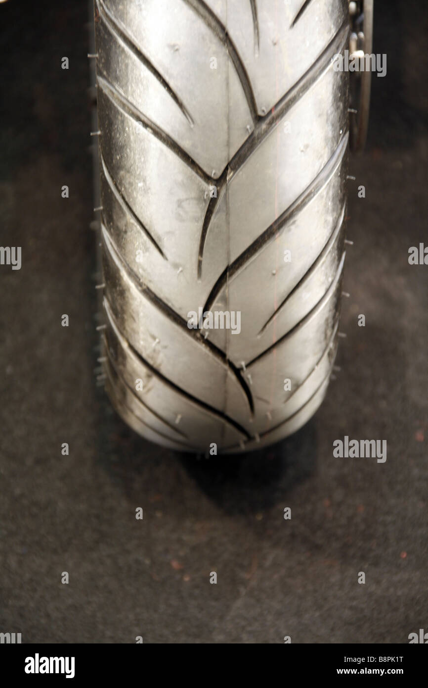 close up of tyre tire grip on scooter motorbike at motor show Stock ...
