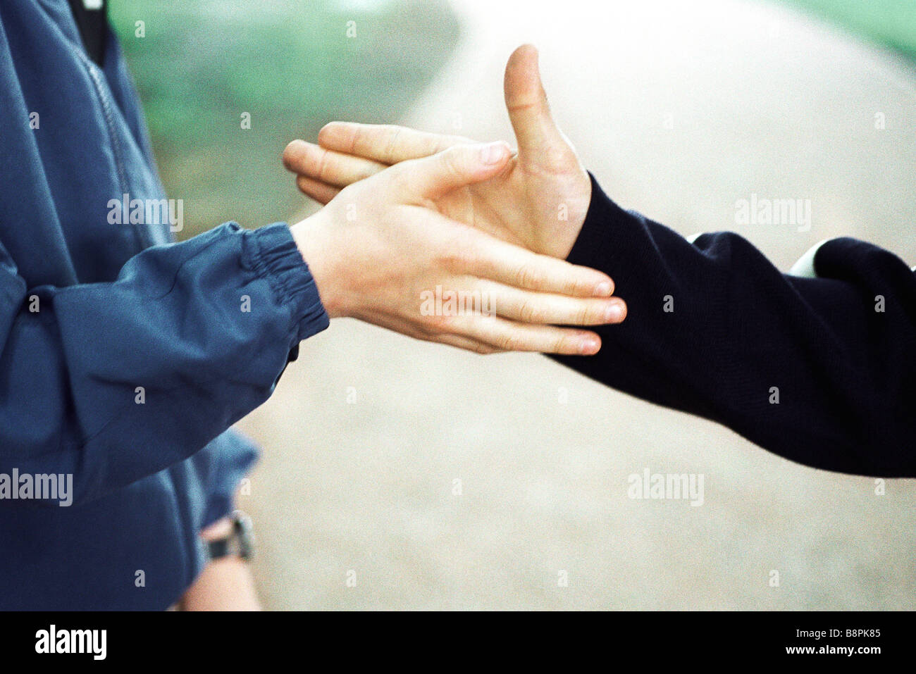 Hand reaching out side view hi-res stock photography and images - Alamy