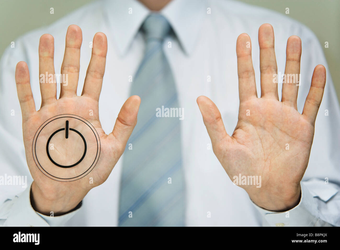 Man pressing power button Stock Photo - Alamy