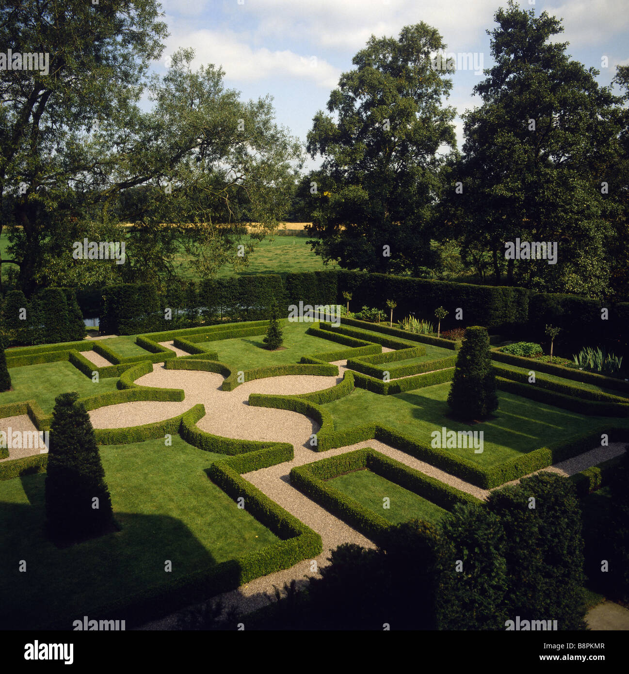 Little Moreton, view of The Knot Garden in summer with low green hedges ...