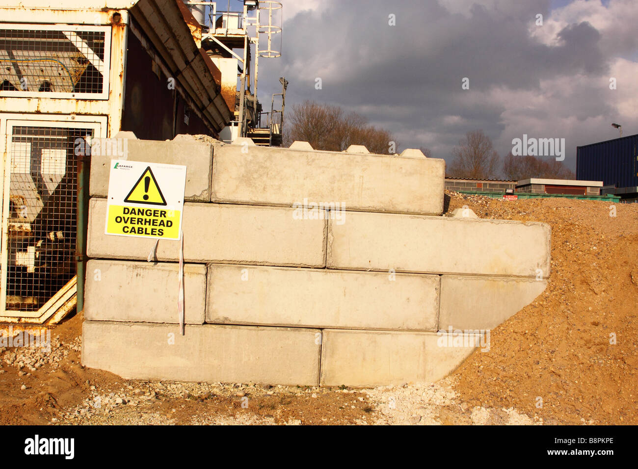 warning sign warning of danger from electric cables hanging between ...