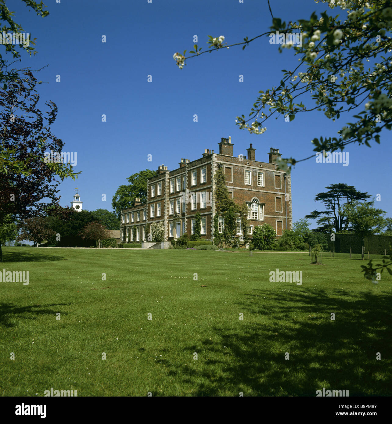 Gunby Hall view across the lawn to the entrance of the red brick house ...