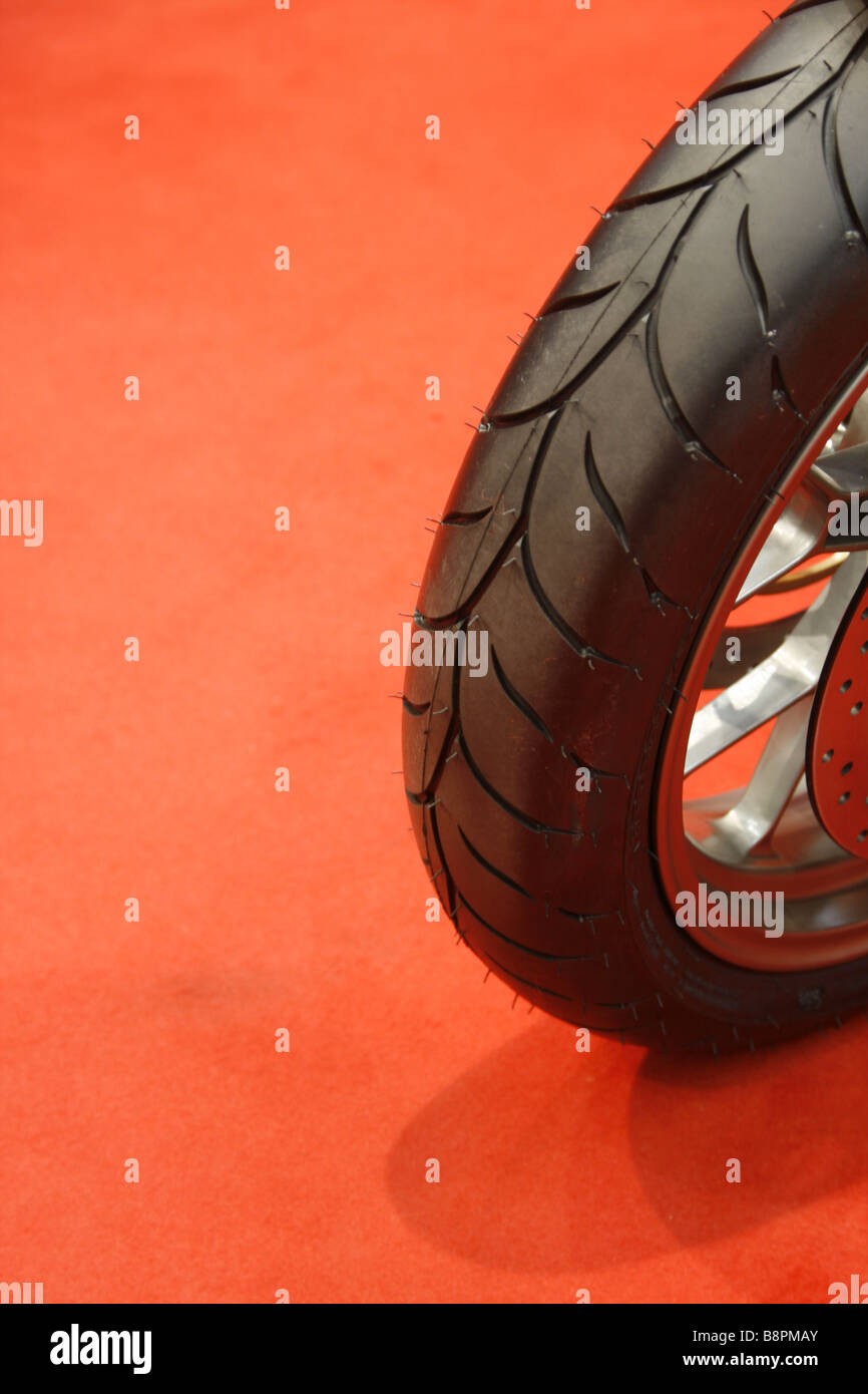 close up of tyre tire grip on scooter motorbike at motor show Stock ...