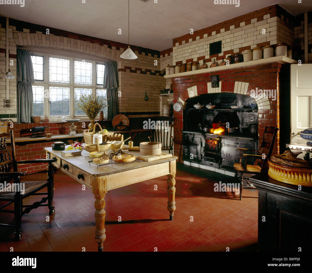 The Kitchen at Wightwick Manor looking towards the table with cooking ...