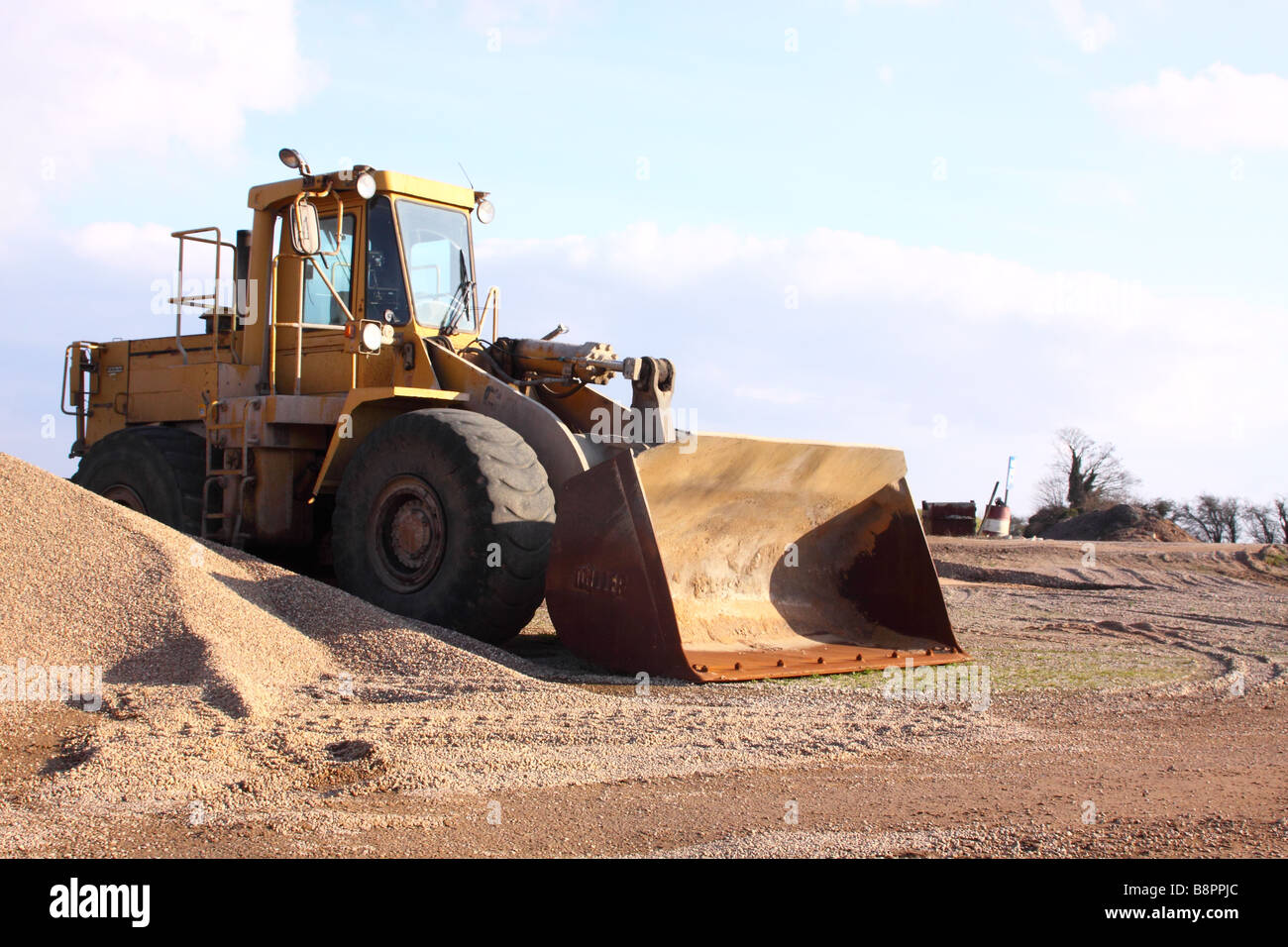 bulldozer or digger used in cromwell quarry for moving extracted sand ...