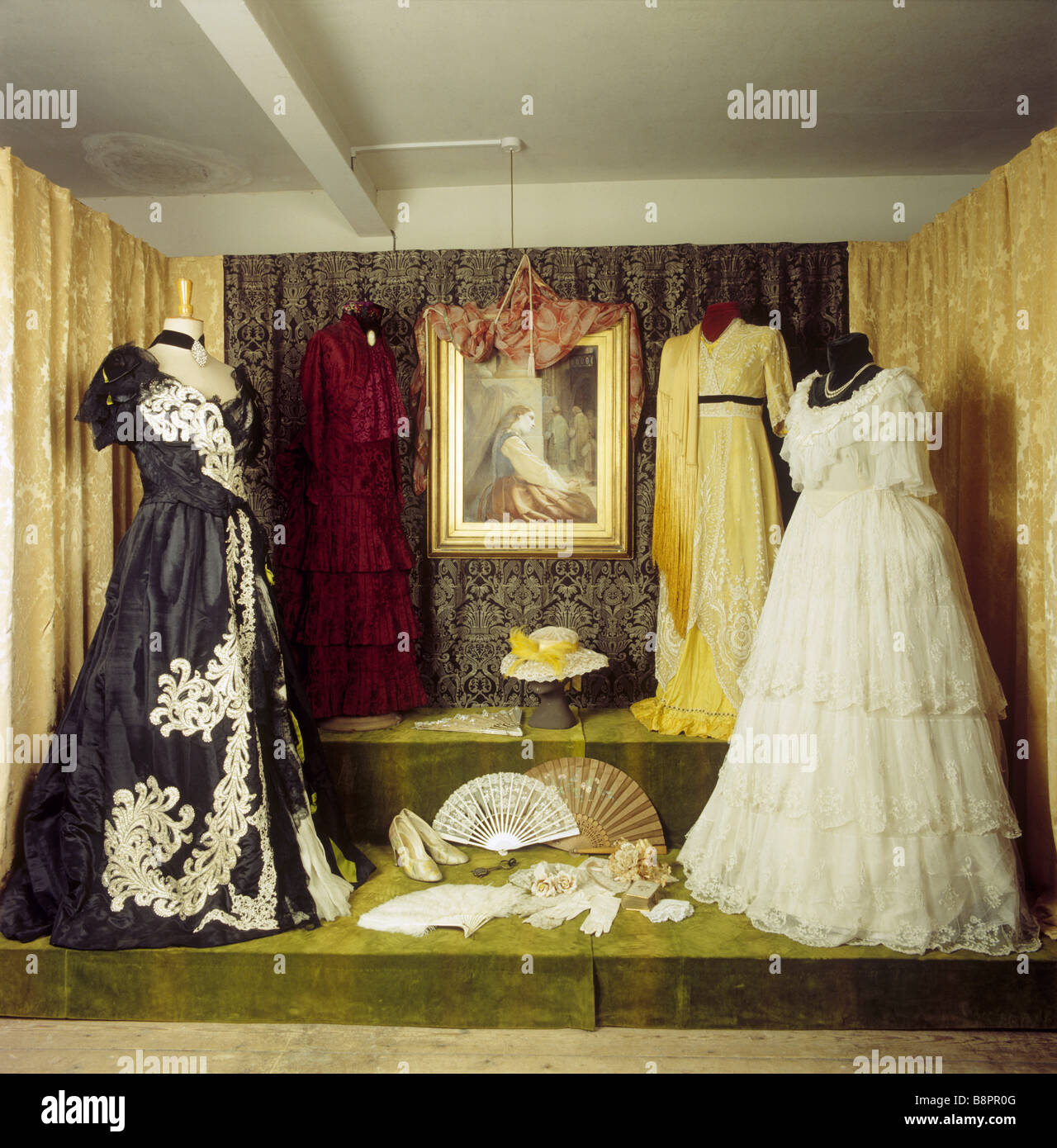 The Costume display in the Tower showing four dresses Stock Photo - Alamy