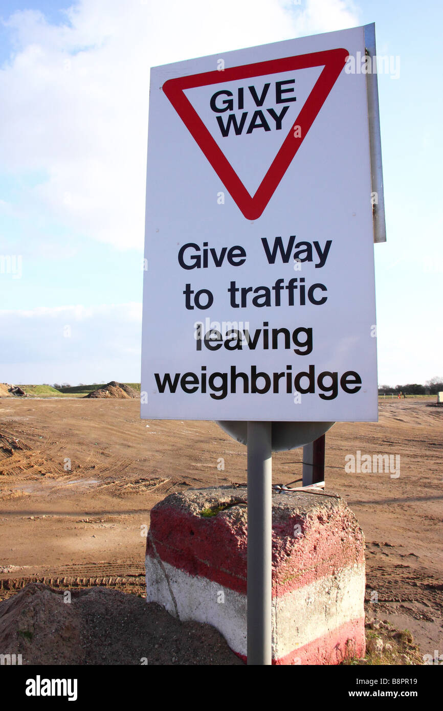 sign reading give way to traffic leaving weighbridge at cromwell quarry ...
