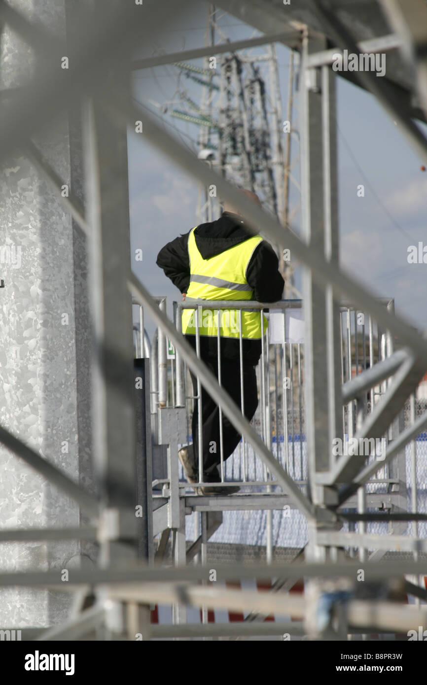 steward security guard in empty grandstand at sports event outdoors ...