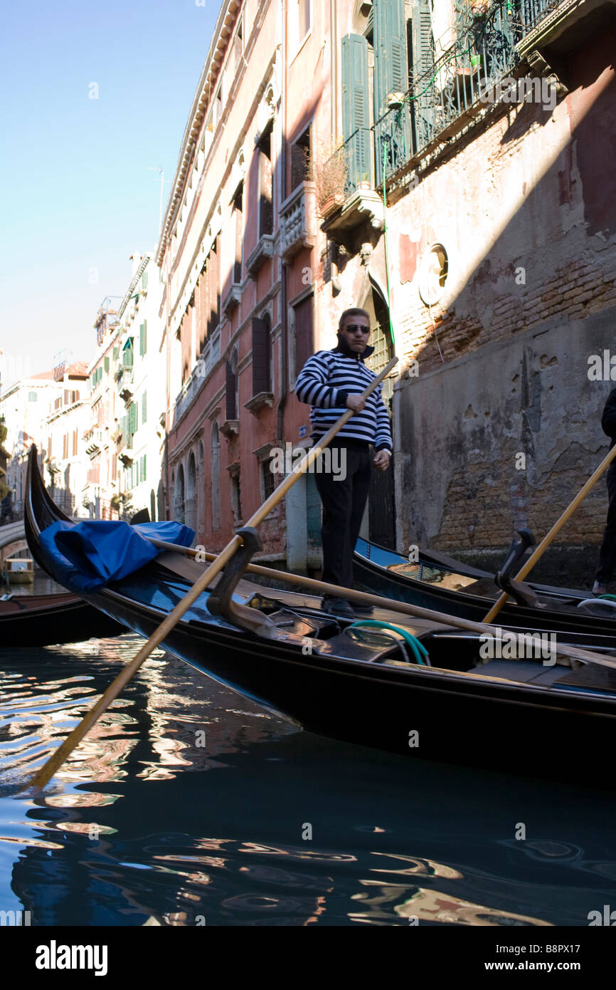 Venice, Italy. Gondolier with his gondola Stock Photo - Alamy