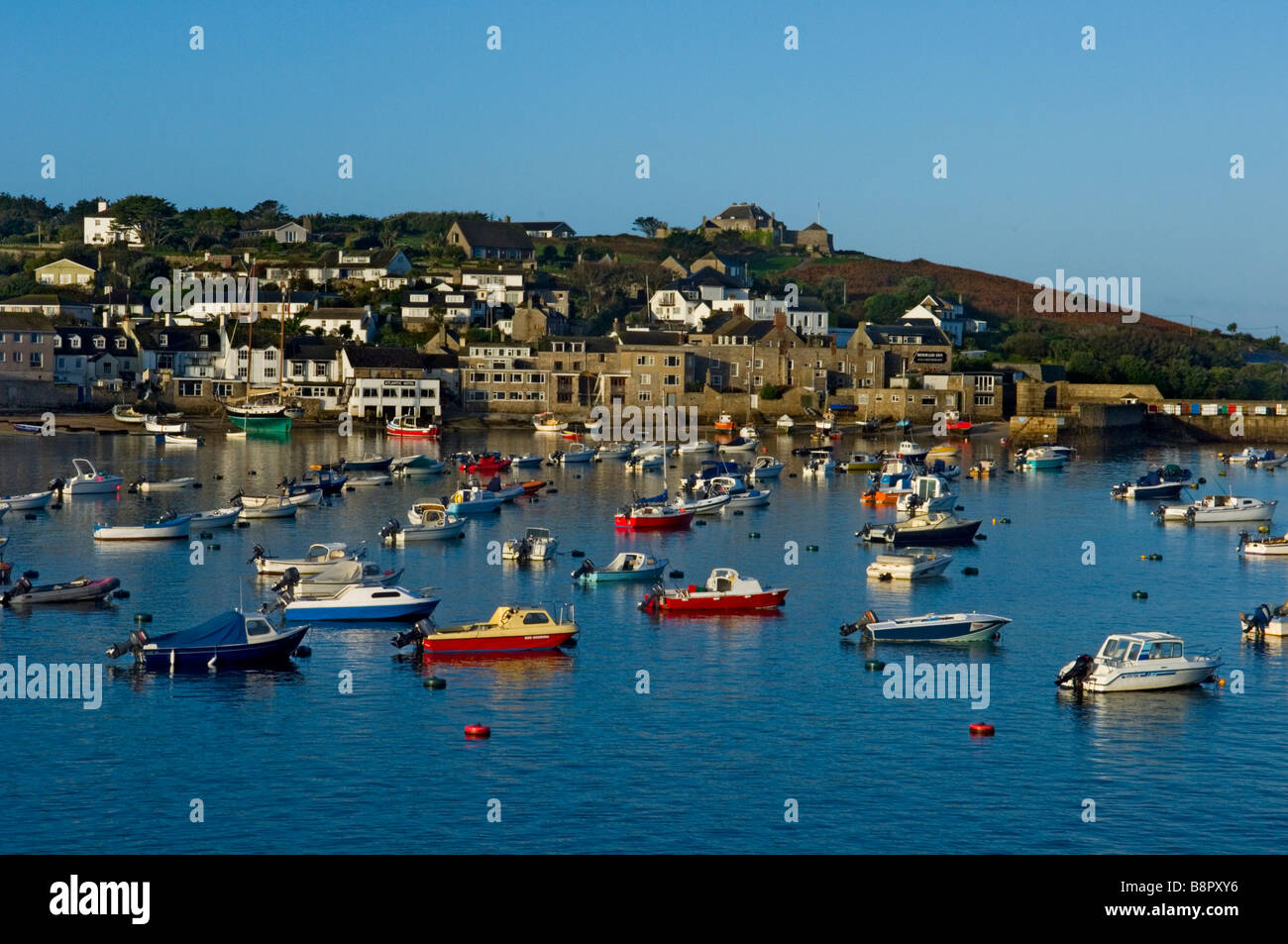 Hugh Town Harbour showing The Atlantic Hotel and The Star Castle Hotel ...