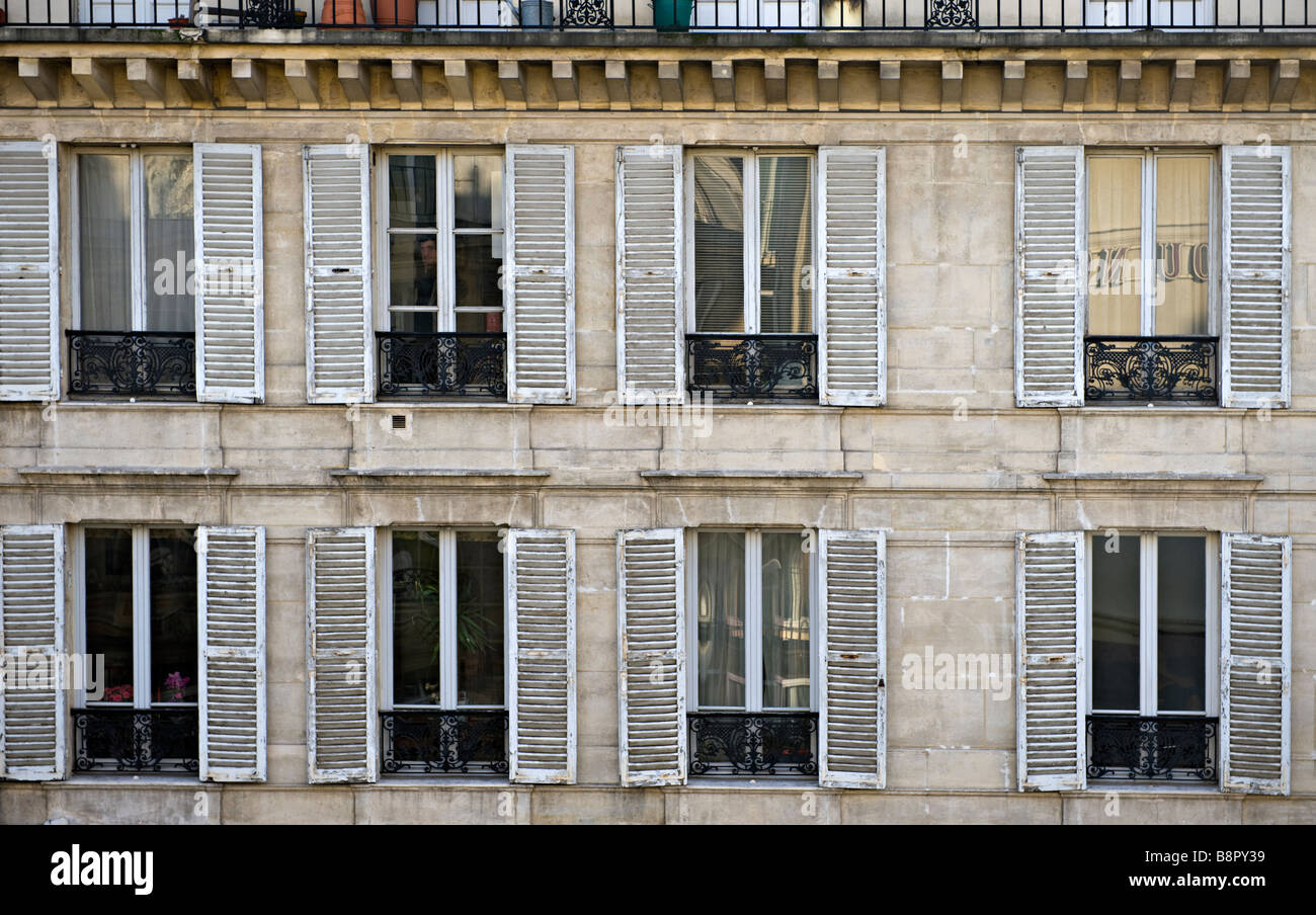 Traditional shutters on a Parisian building Stock Photo - Alamy