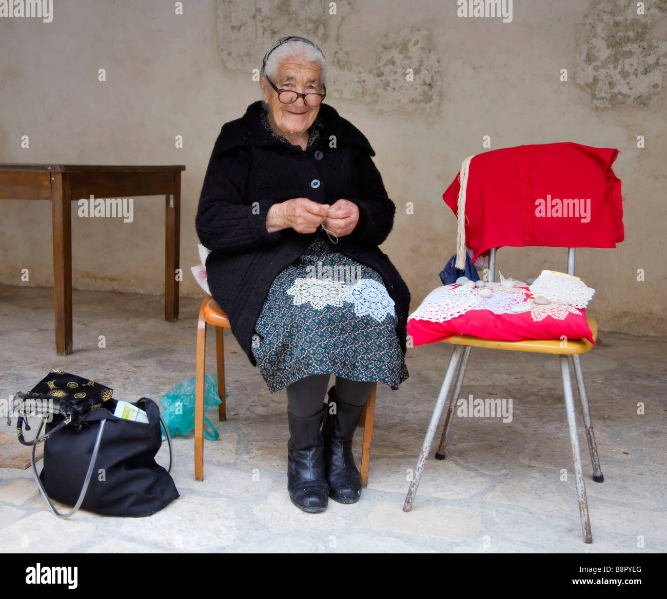 old lady making lace, troodos mountains, cyprus Stock Photo - Alamy