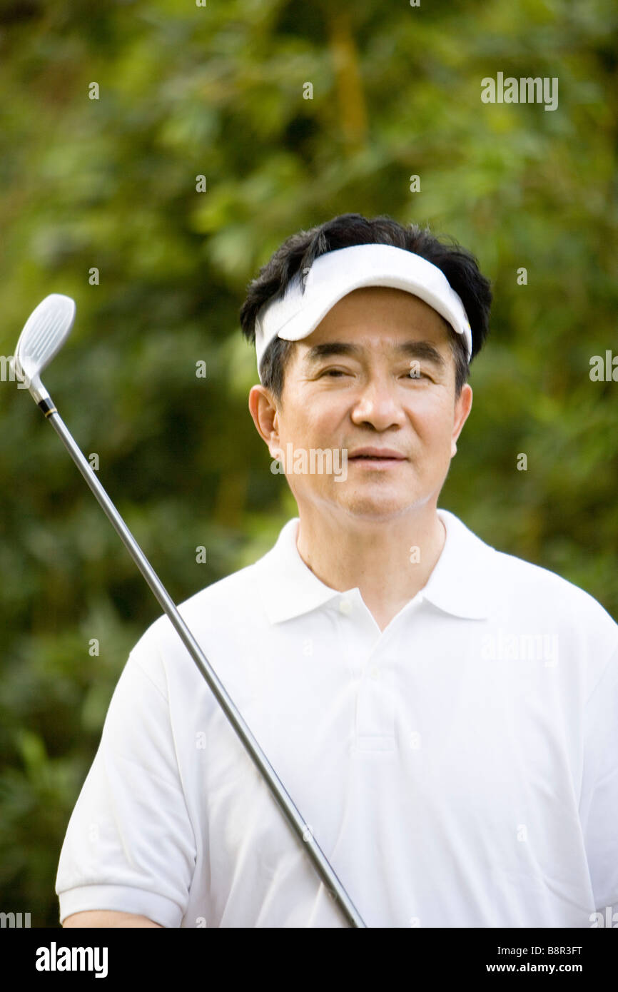 Asian chinese man holding golf hi-res stock photography and images - Alamy