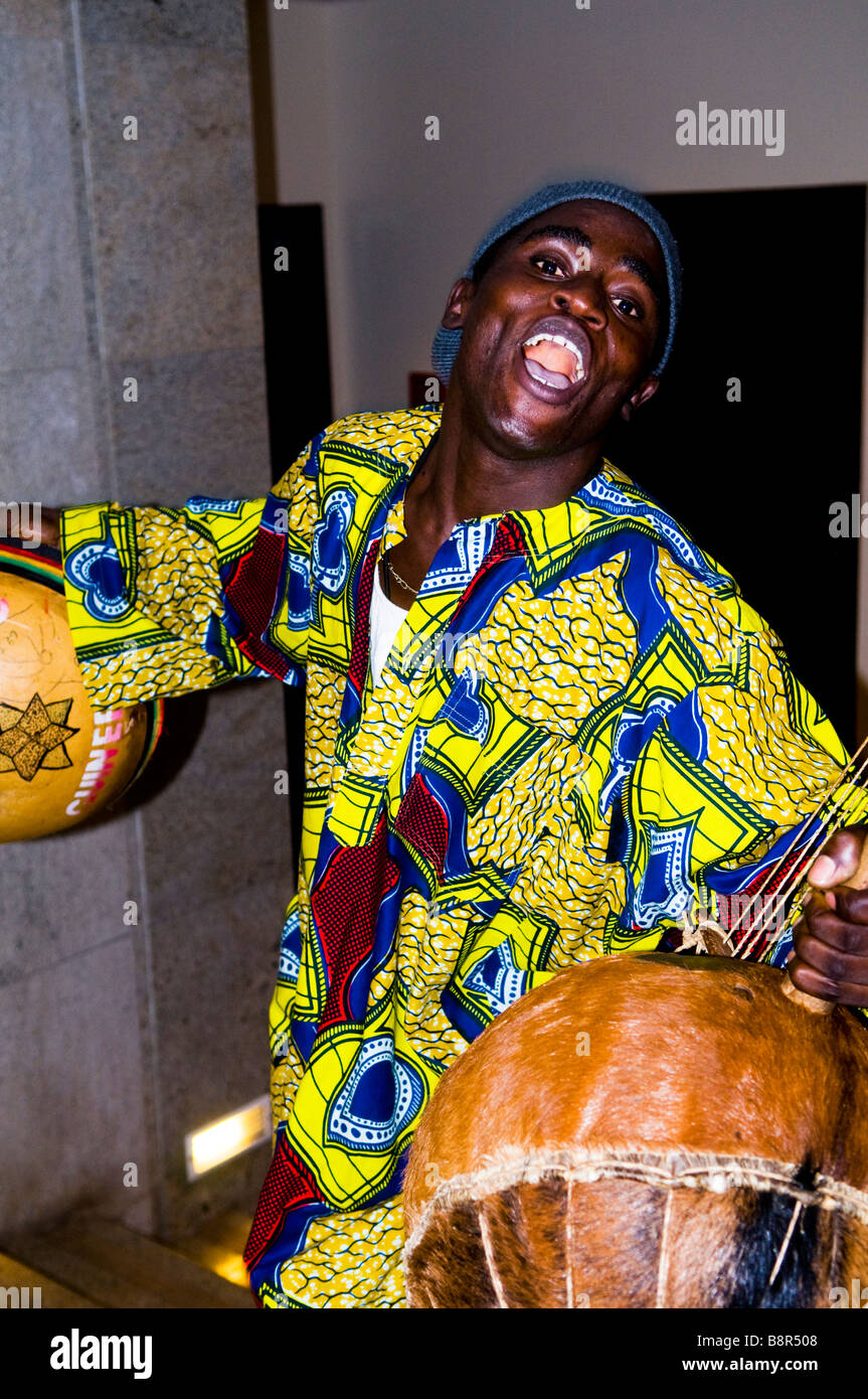 A musician from Guinea Conakry dancing with his Bolon ( traditional ...