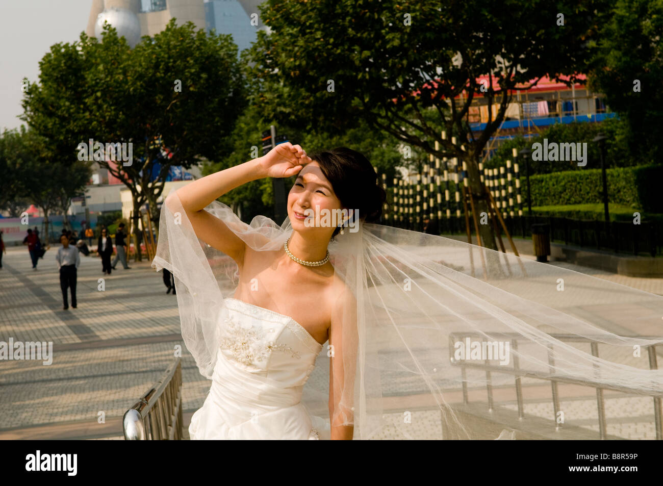 A Chinese bride in the Pudong Financial district in Shanghai Stock ...