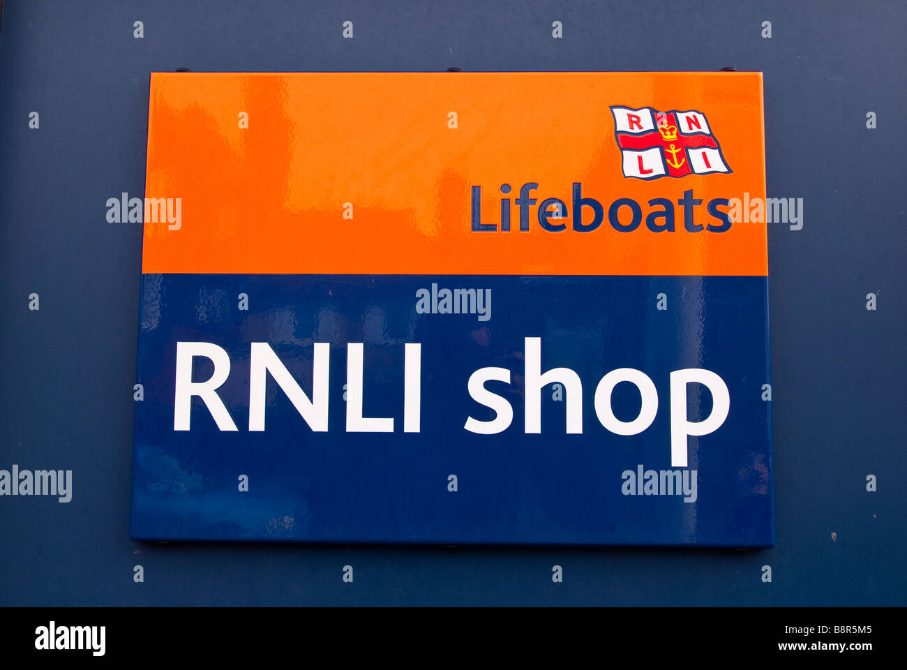 RNLI Sign outside shop store Stock Photo - Alamy