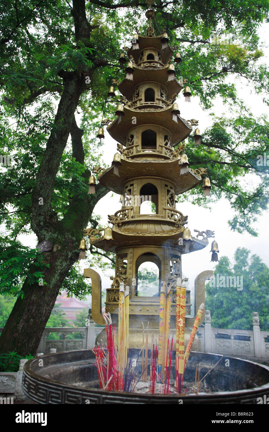 Incense burner and pagoda Stock Photo - Alamy