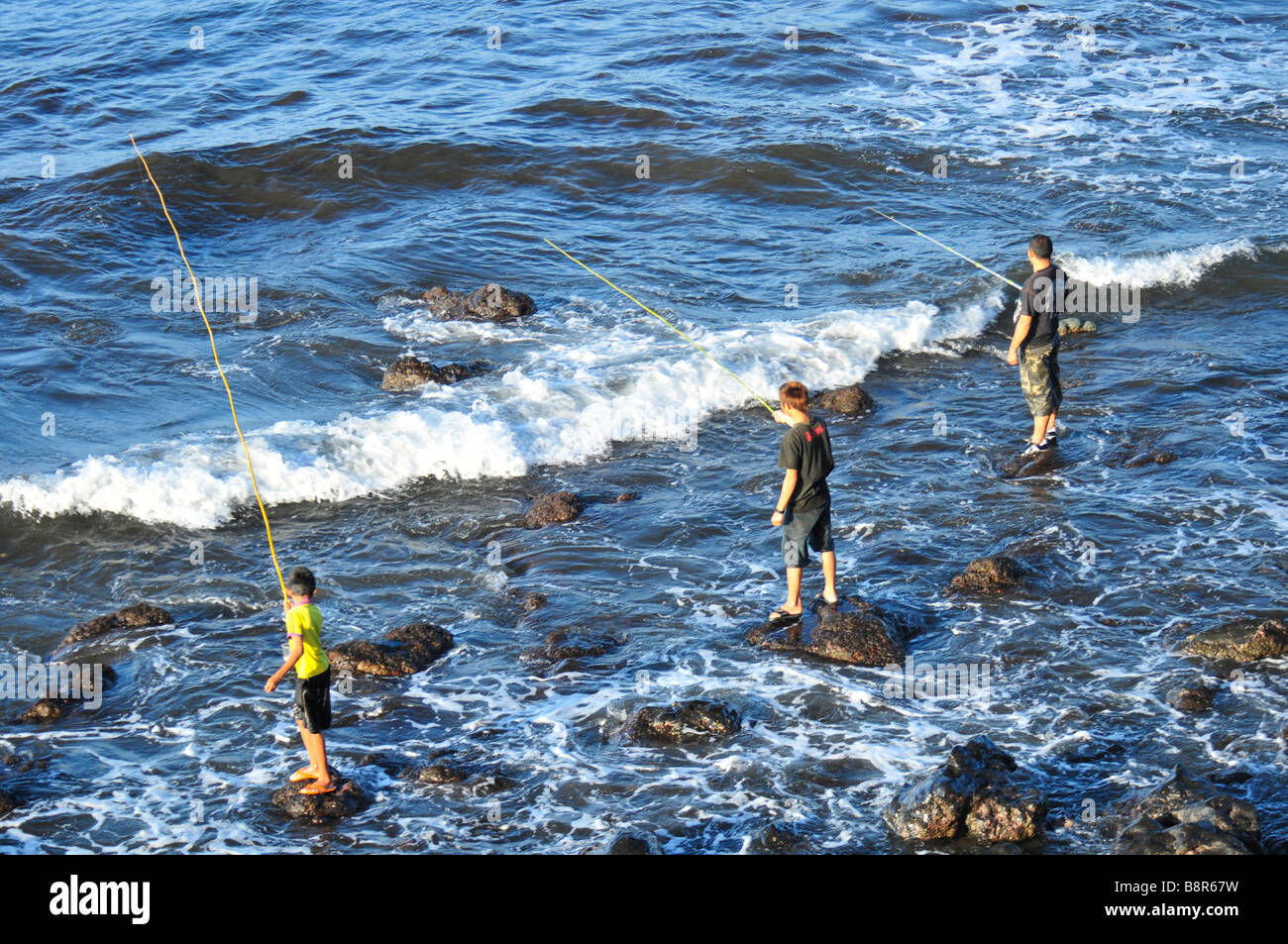 fishing in the sea,Bali,Indonesia Stock Photo - Alamy