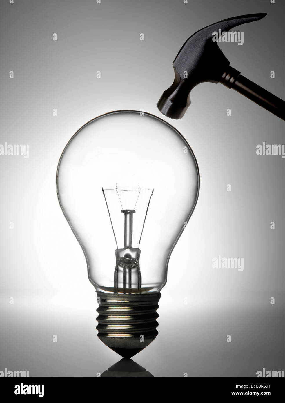 break a light bulb Stock Photo - Alamy