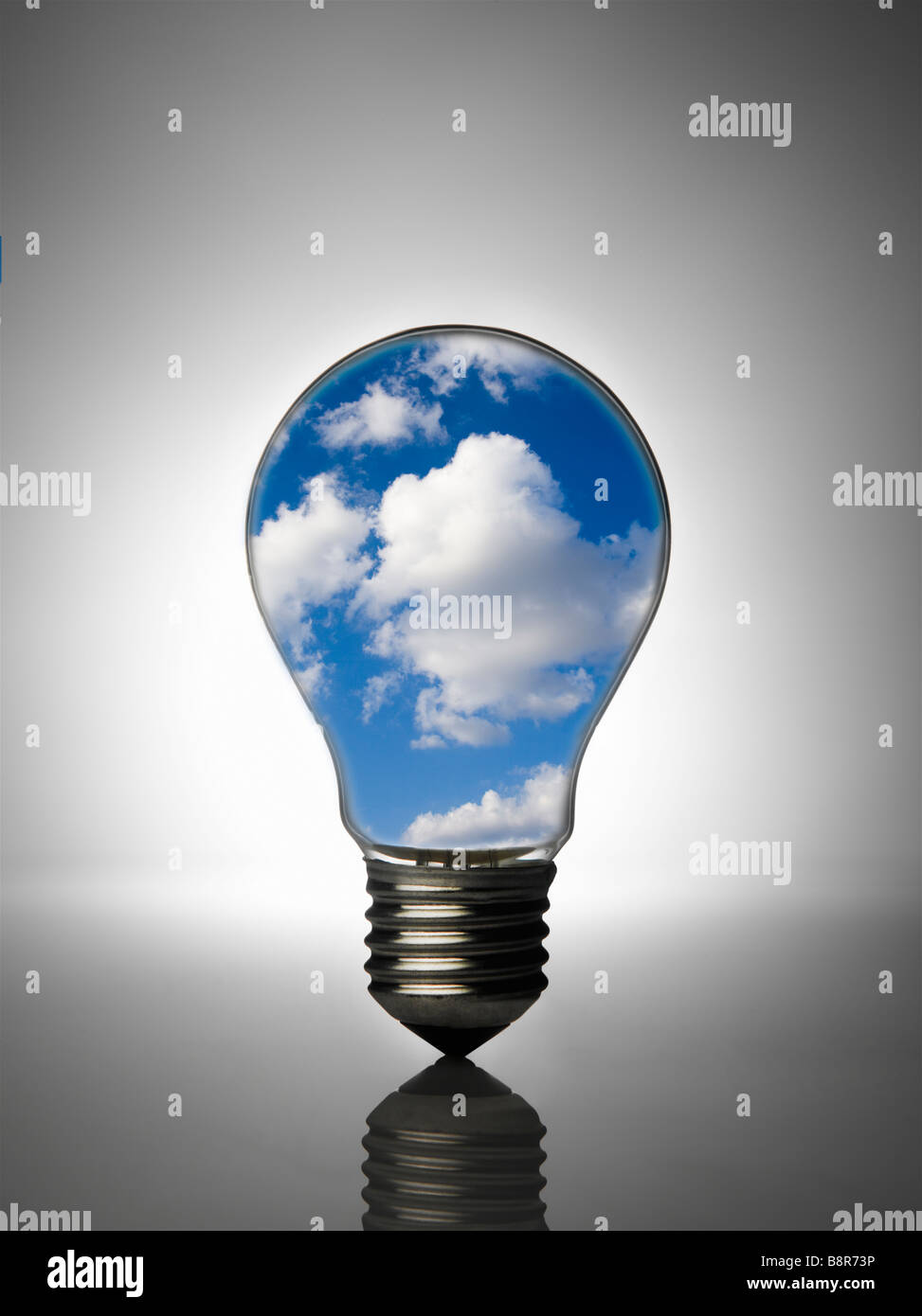 Clean energy a light bulb with a bright sky Stock Photo - Alamy