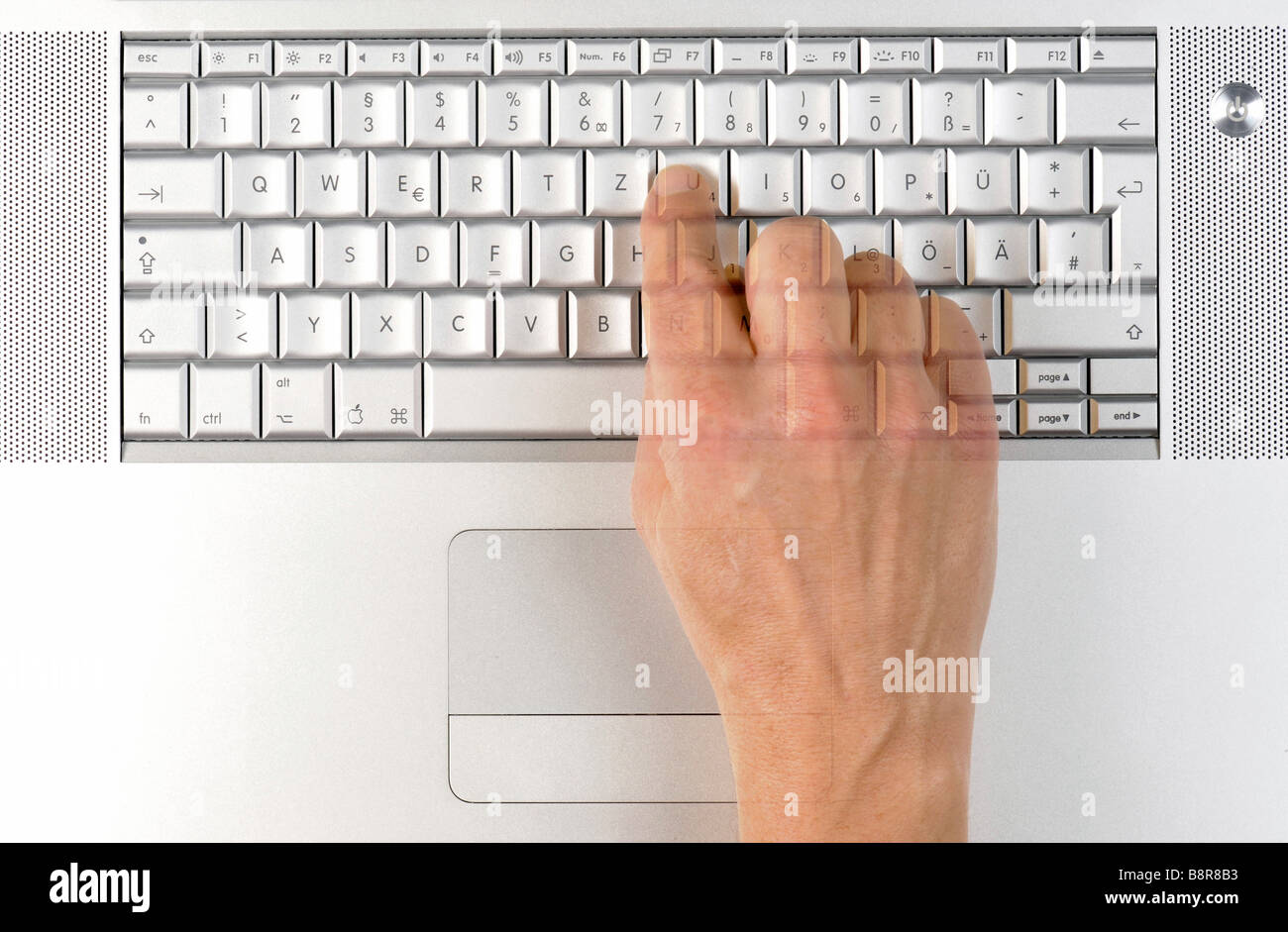 hand typing on a Apple MacBook Pro keyboard Stock Photo - Alamy