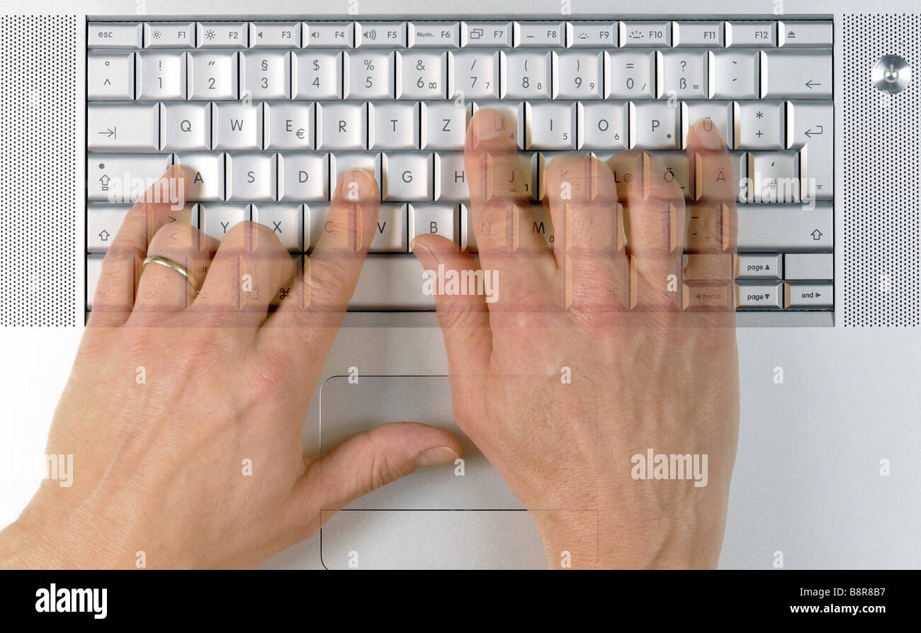 Two hands typing hi-res stock photography and images - Alamy