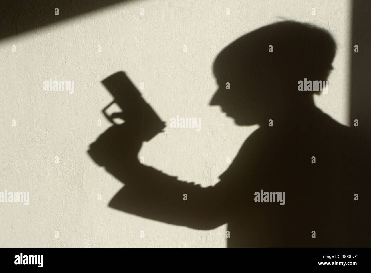Shadow gun hi-res stock photography and images - Alamy