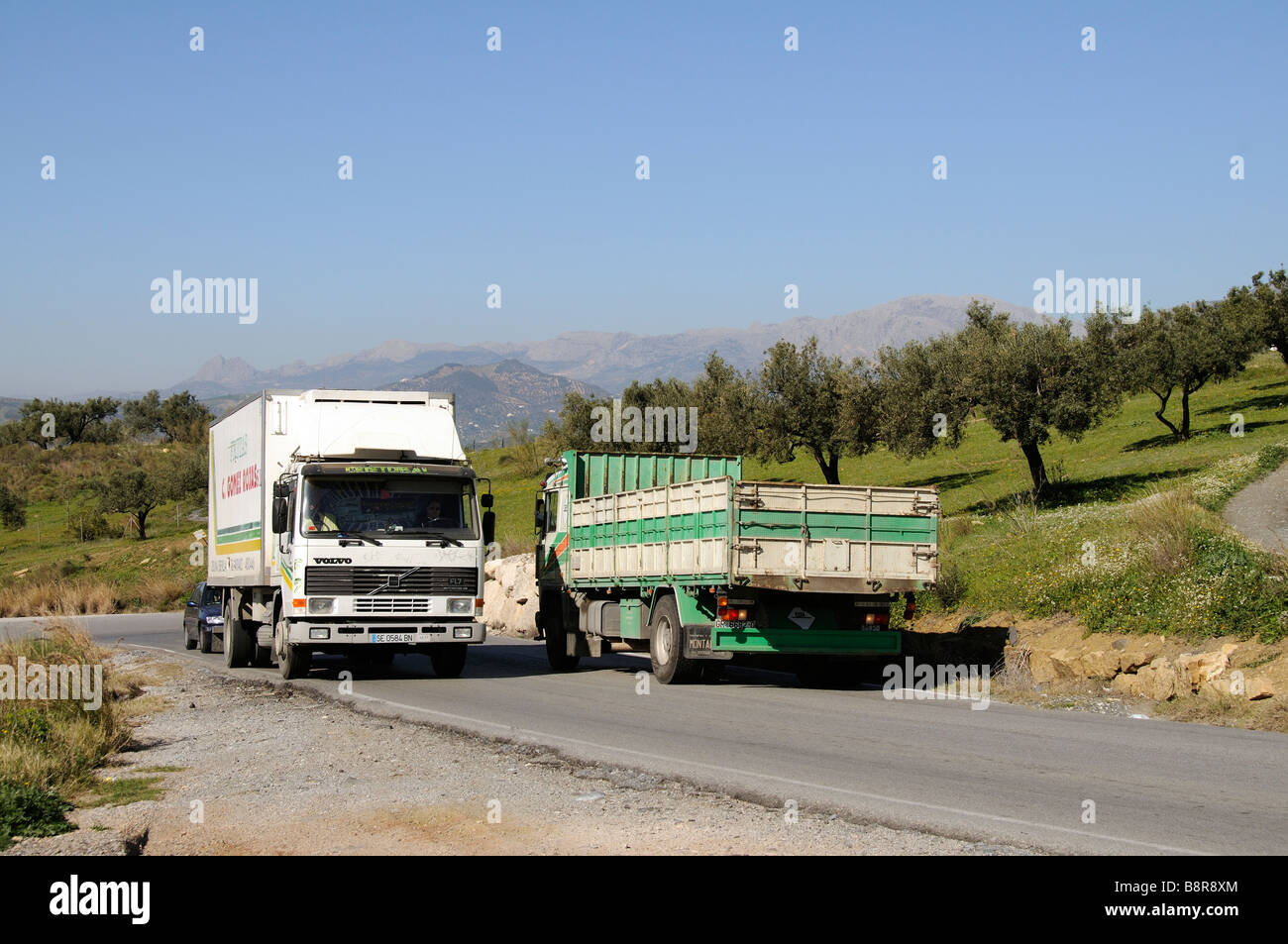 Two haulage lorries passing on a Spanish mountain road Stock Photo - Alamy