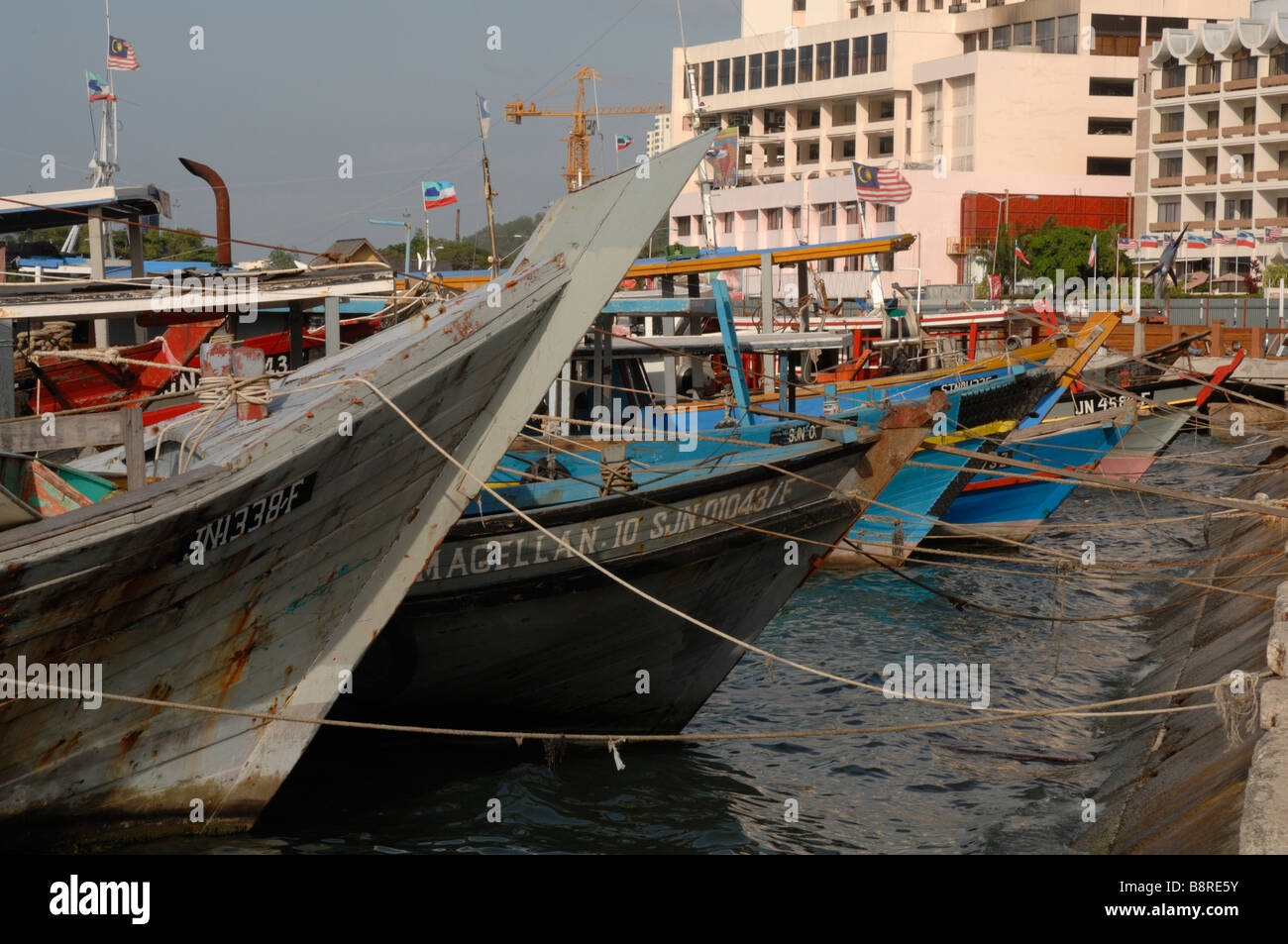 Fishing boats tied up infront of SAFMA fish market Kota Kinabalu Sabah ...