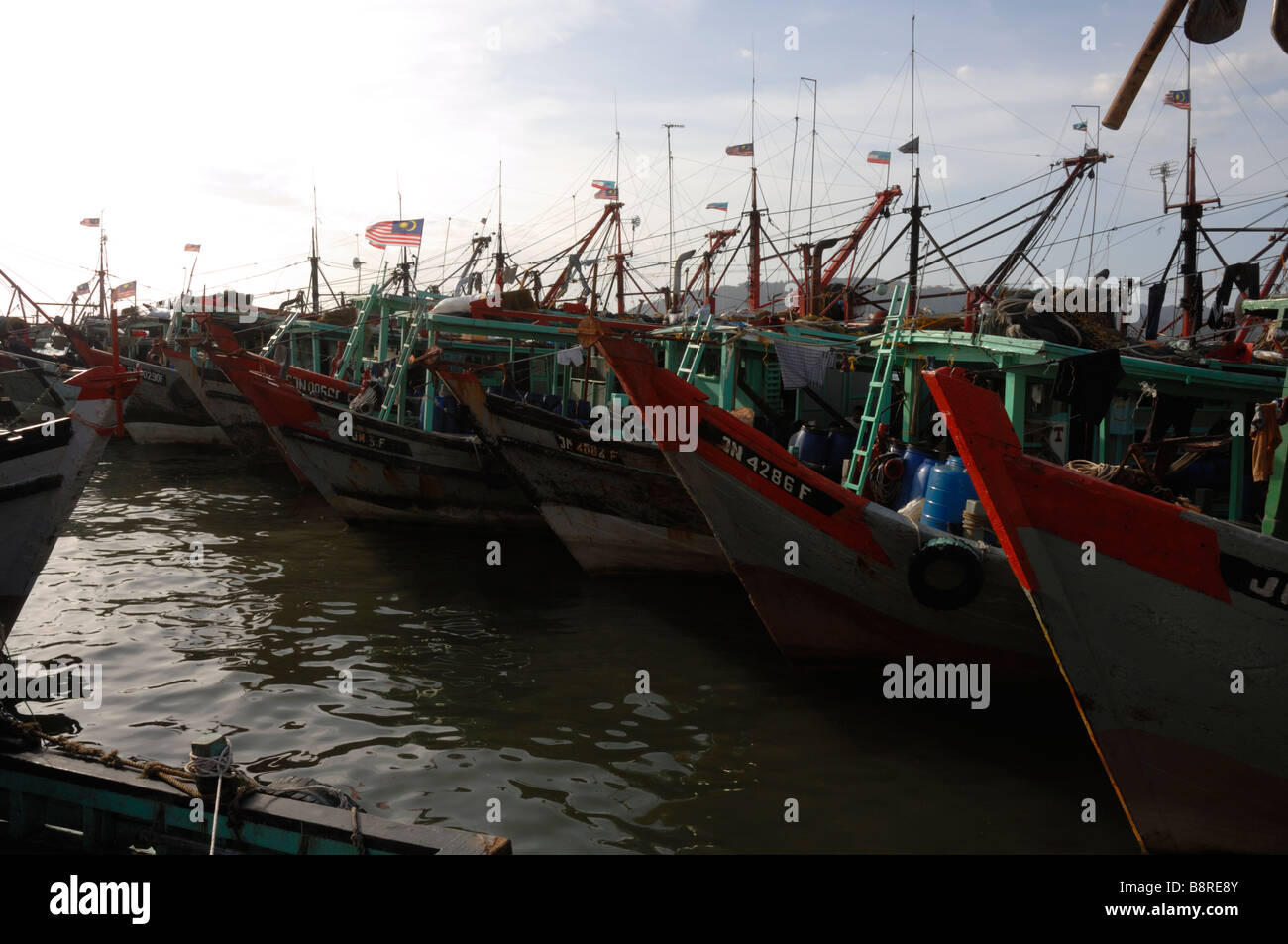 Fishing boats tied up infront of SAFMA fish market Kota Kinabalu Sabah ...