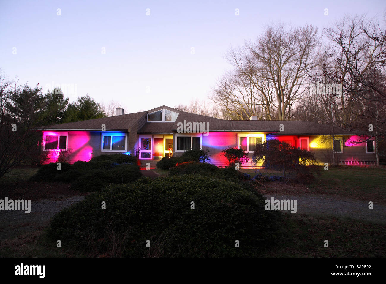 Front of contemporary ranch house at night painted with different ...