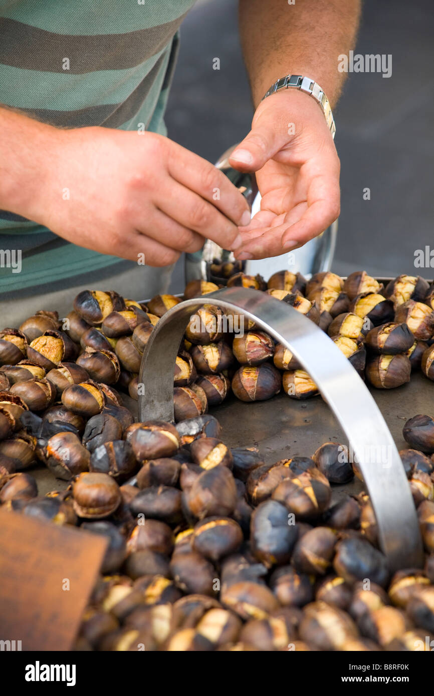 Chestnut seller on the streets of Rome Stock Photo - Alamy