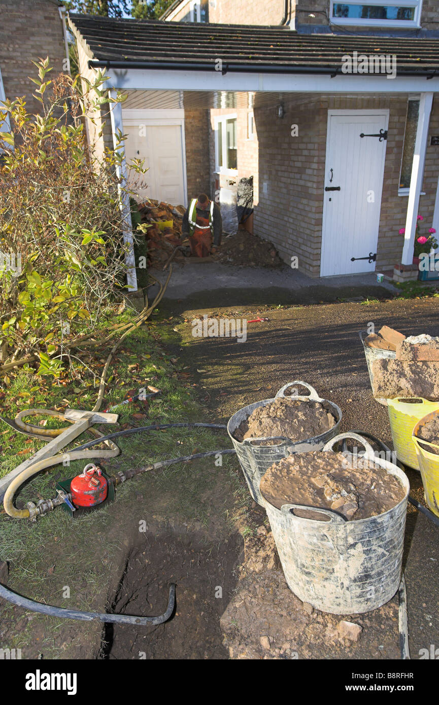 Boring hole for water supply pipe pulling through bore pipe Stock Photo ...