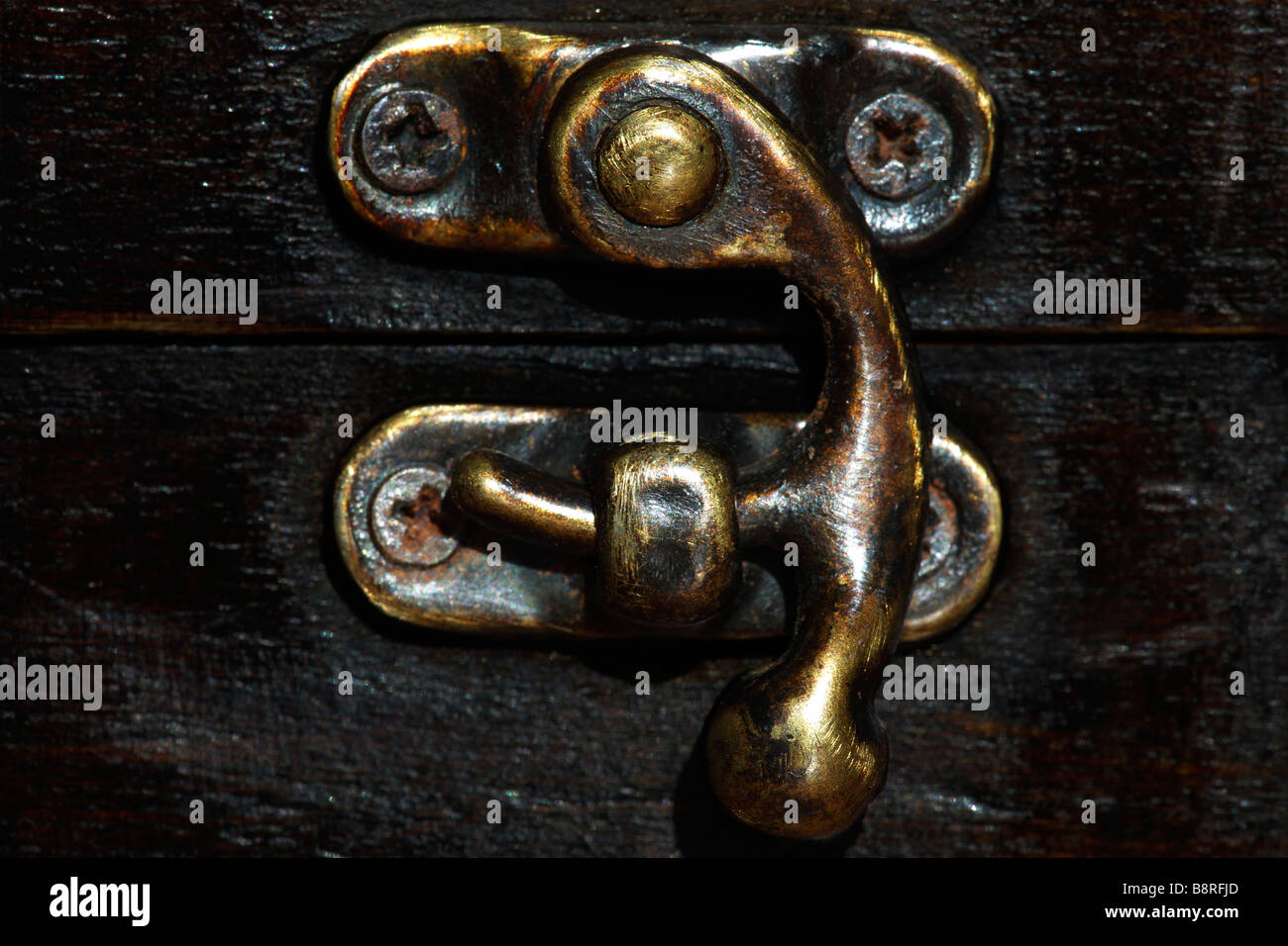 Close-up of closed ancient treasure box lock Stock Photo - Alamy
