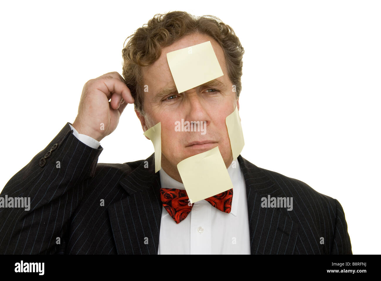 businessman with post it notes trying to remember scratching head Stock ...