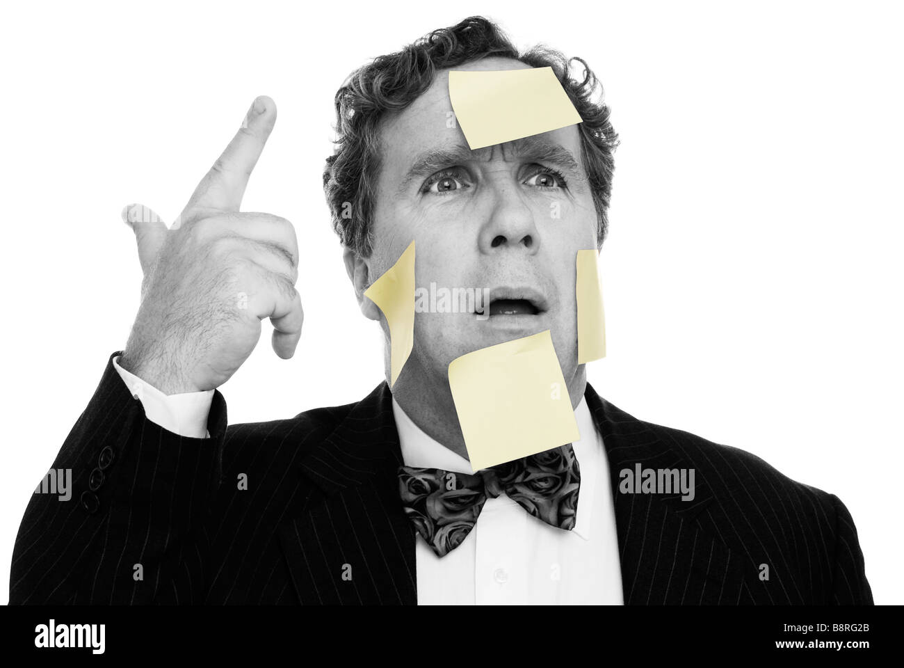 businessman with post it notes remembering Stock Photo - Alamy