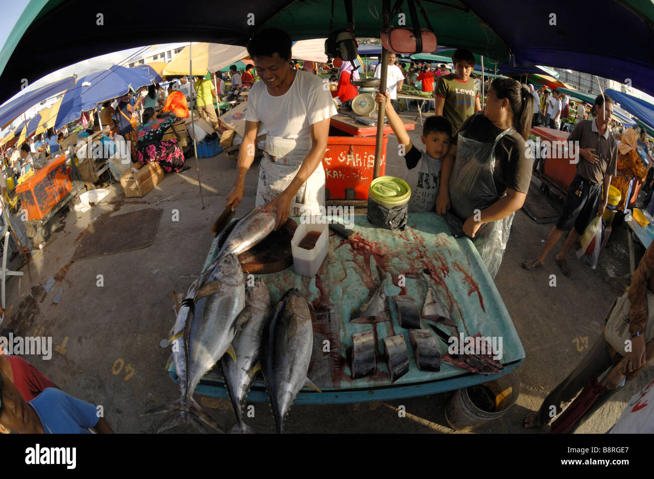 Customers and vendors selling and buying fish fish market waterfront ...